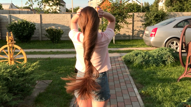 Long hair model Irina's mane in the garden (Ltress video vs402) - Payhip